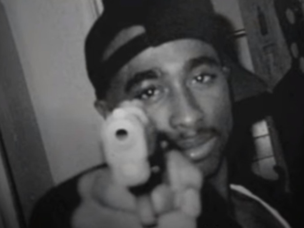 Tupac Holding A Gun